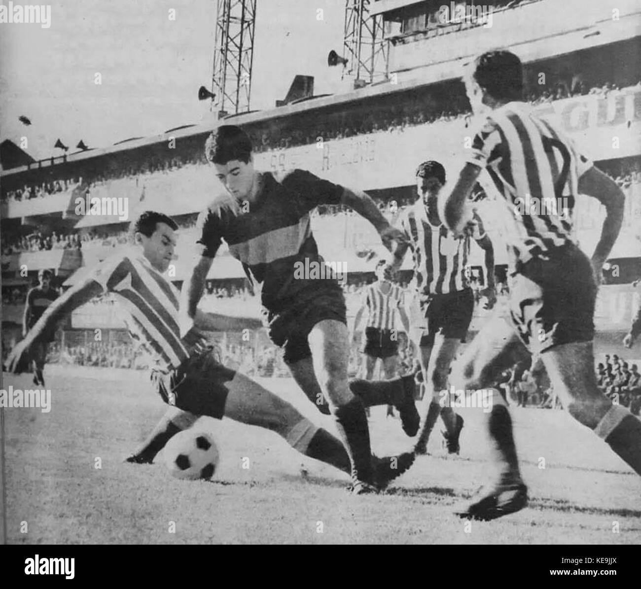 Dribbling soccer player football Black and White Stock Photos & Images ...