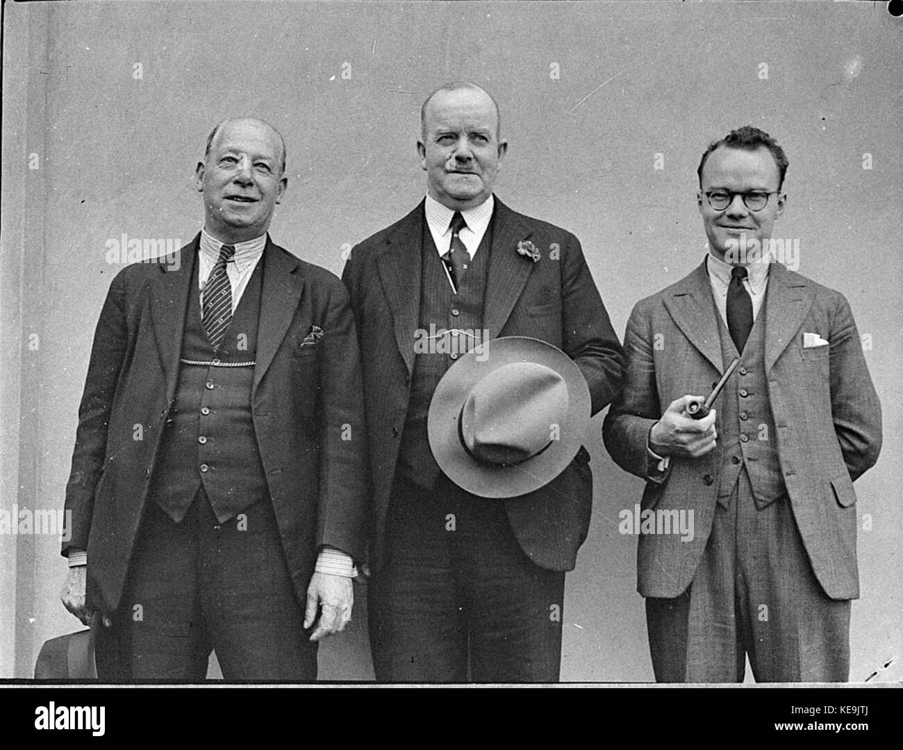 Three men in suits Black and White Stock Photos & Images - Alamy