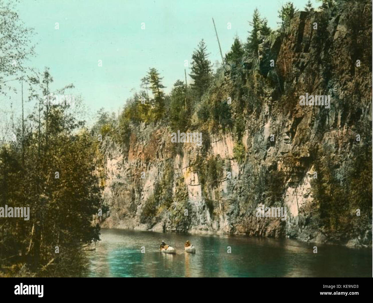 This photograph from the 1920s shows a canoe journey through Algonquin ...