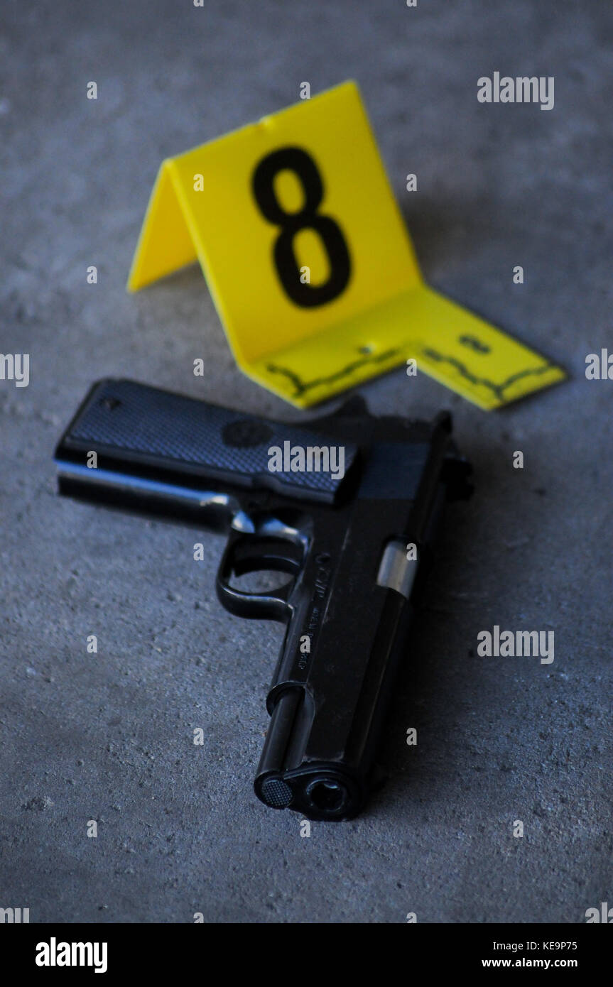 Hand gun crime scene hi-res stock photography and images - Alamy