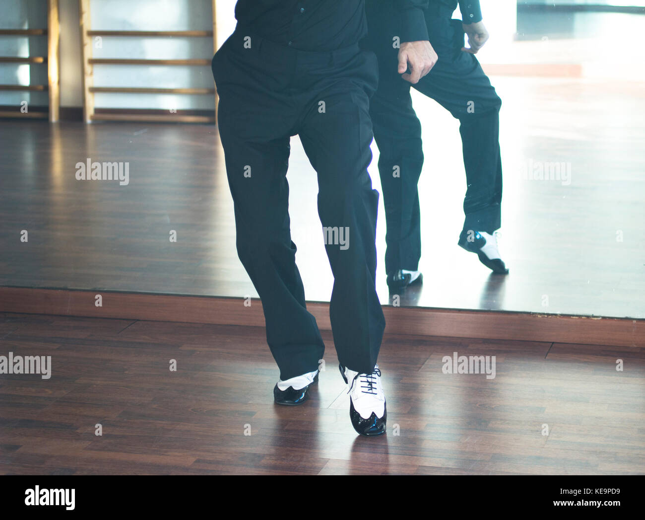 Ballroom dance male dancer and teacher in studio school dancing in ...