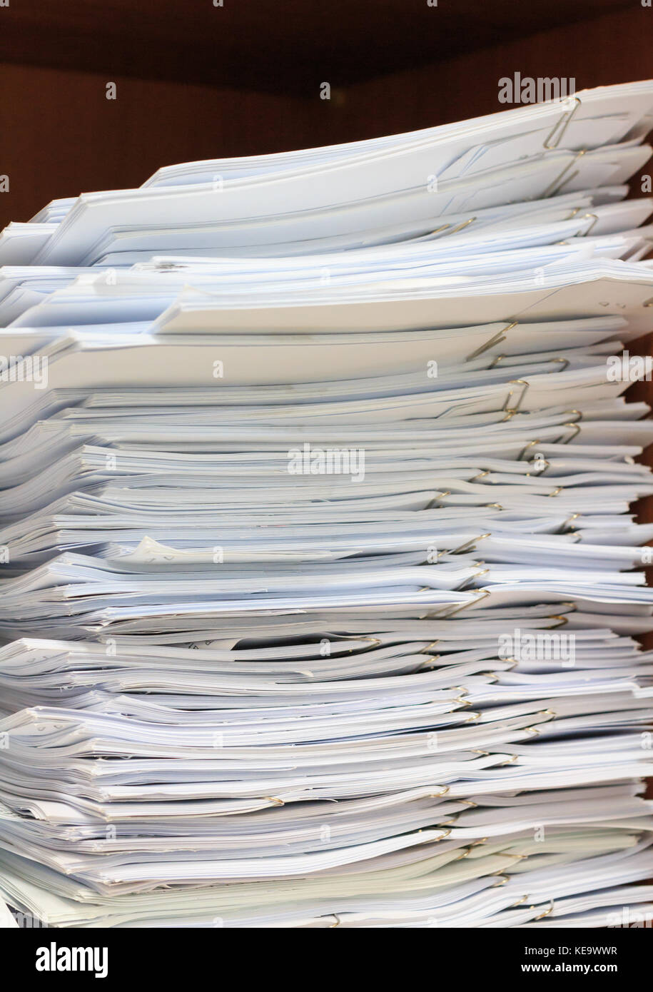 Stack of white papers fin storage box Stock Photo - Alamy