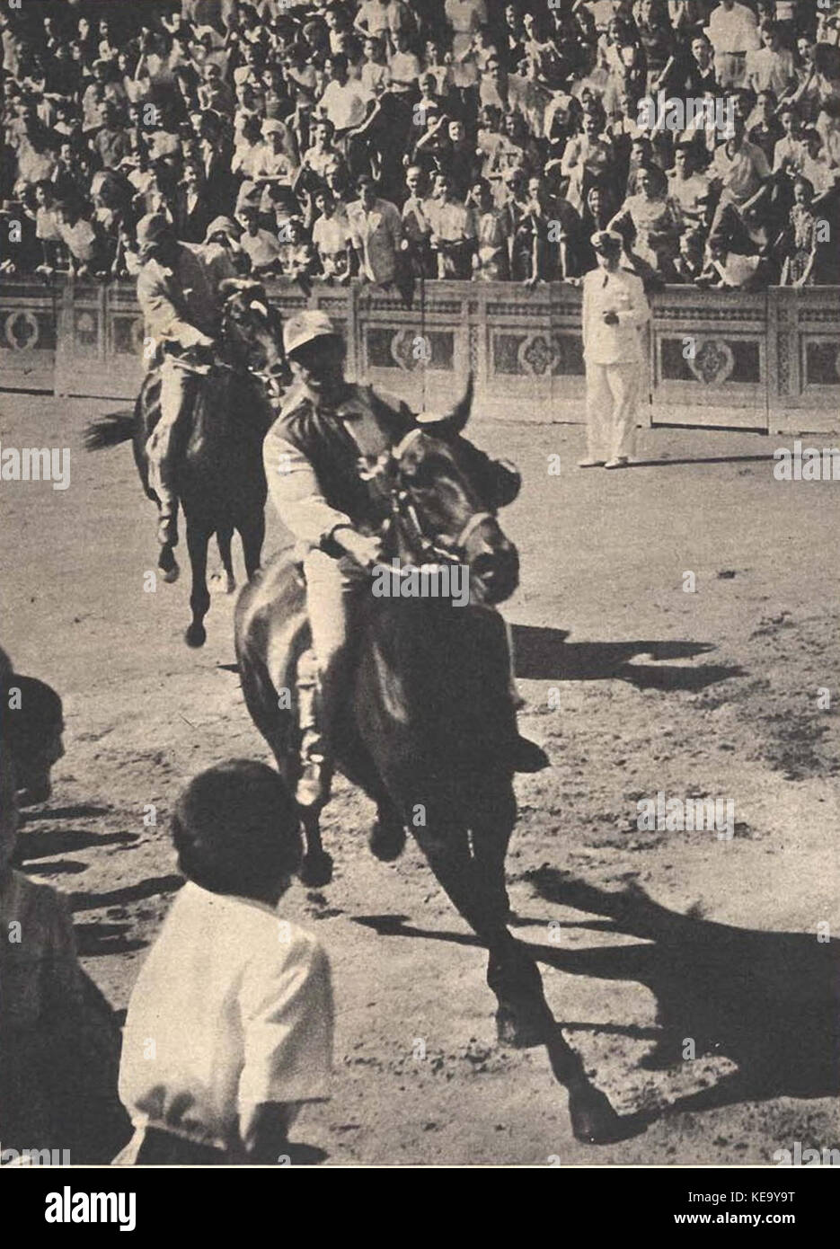 The Palio di Siena, a historic horse race in Italy, is depicted here ...