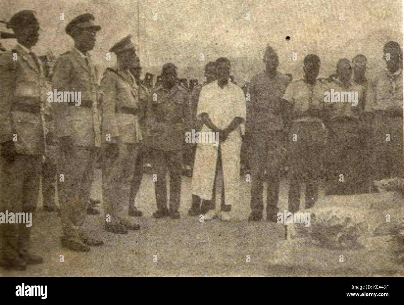 A solemn scene from the funeral of Colonel Kokolo, honoring his life ...