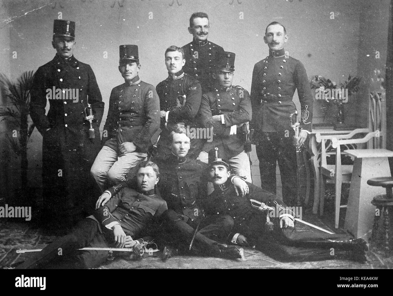 This tableau photograph showcases a soldier in uniform with a sword ...
