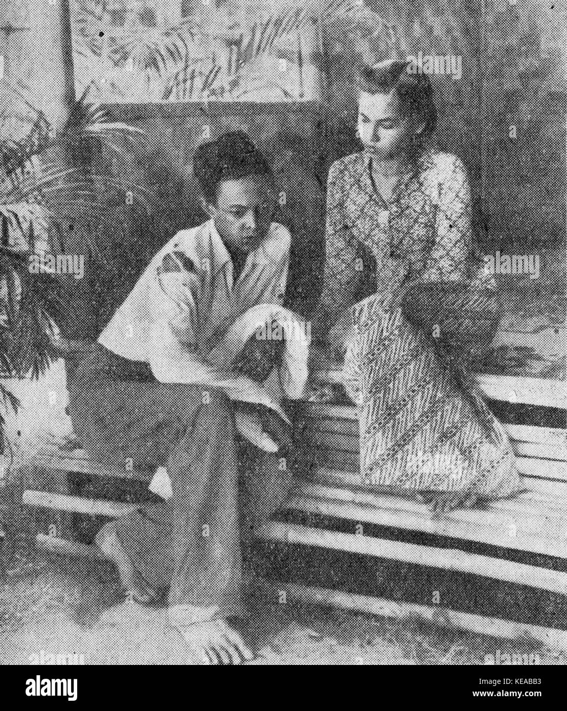 On steps of temple Black and White Stock Photos & Images - Alamy