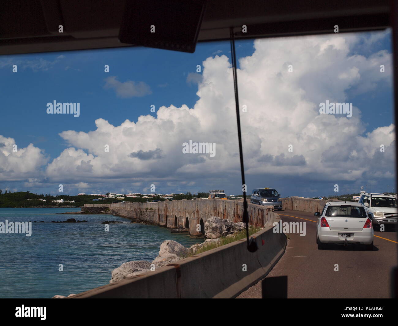 Bermuda traffic on The Causeway heading towards L F Wade International airport Stock Photo - Alamy