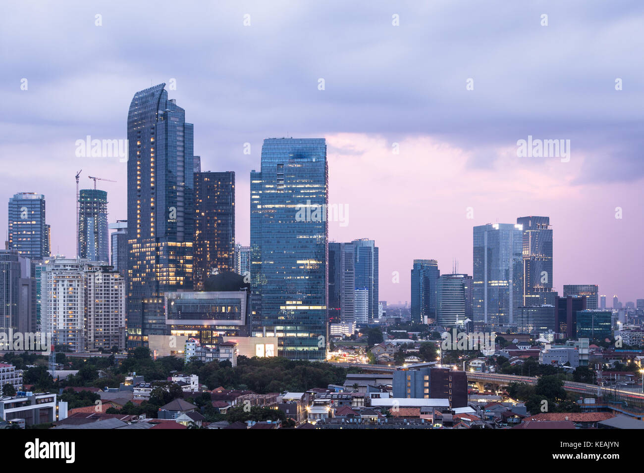 JAKARTA, INDONESIA - OCTOBER 15, 2017: The sun sets over Jakarta ...