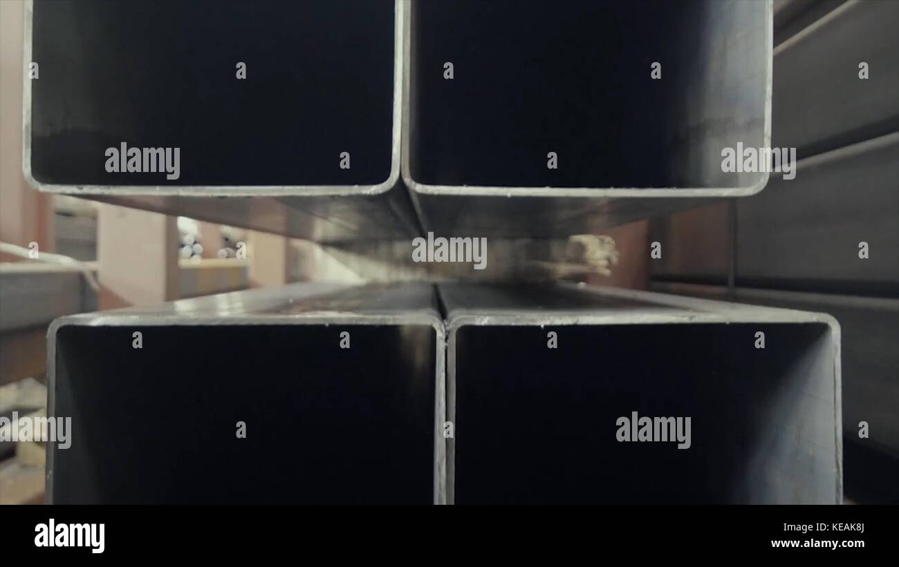 Steel tube, square high carbon metal tube background for heavy industry ...