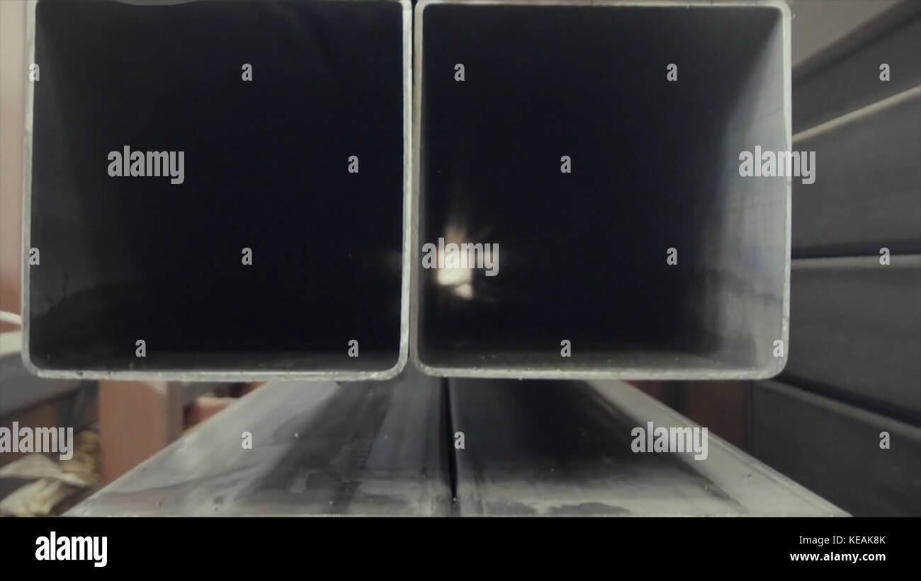 Steel tube, square high carbon metal tube background for heavy industry ...