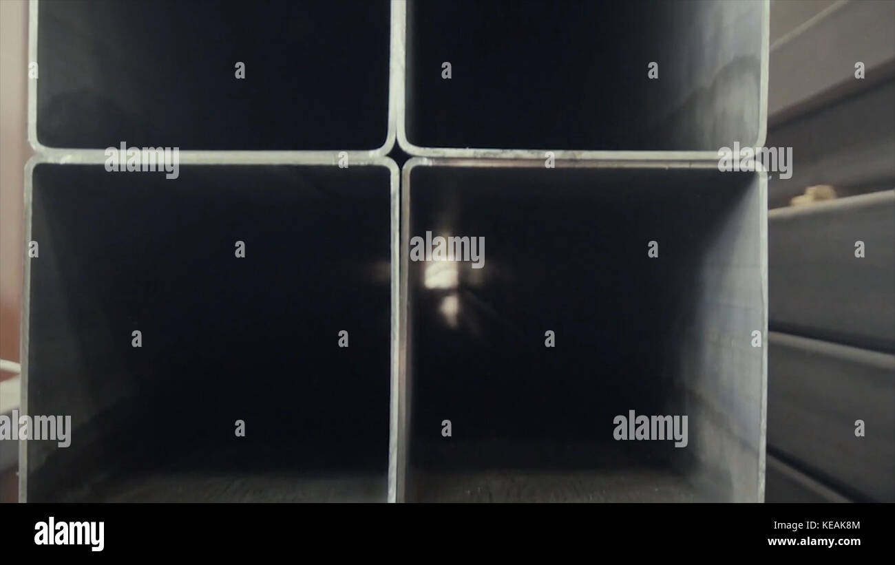 Steel tube, square high carbon metal tube background for heavy industry ...