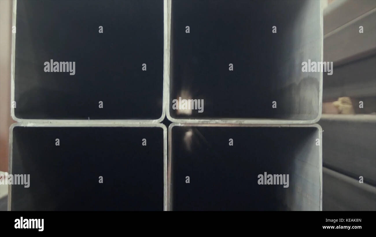 Steel tube, square high carbon metal tube background for heavy industry ...