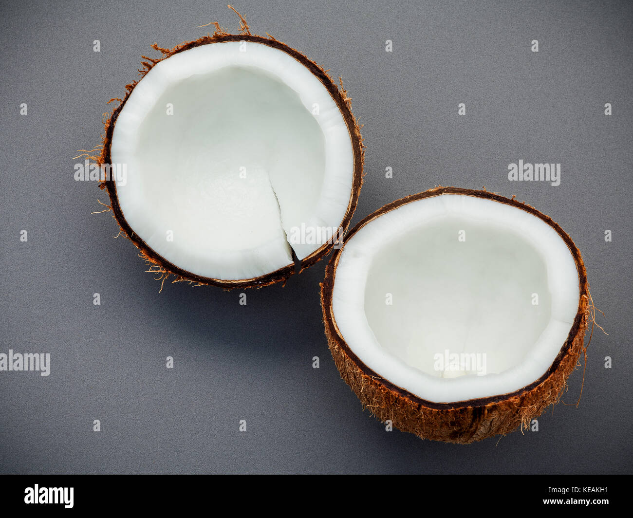 Whole of coconut shell on gray background flat lay and copy space. top ...