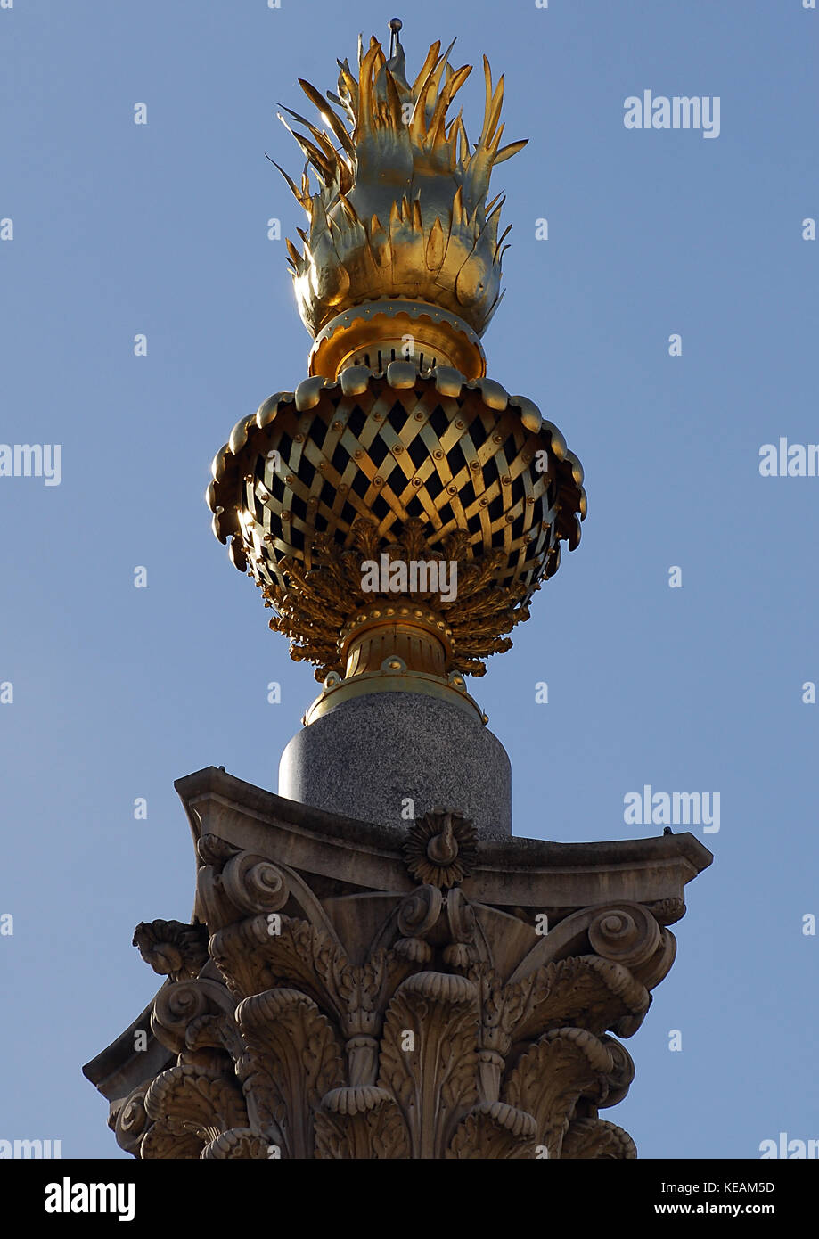 The Golden top of Monument in London Stock Photo - Alamy