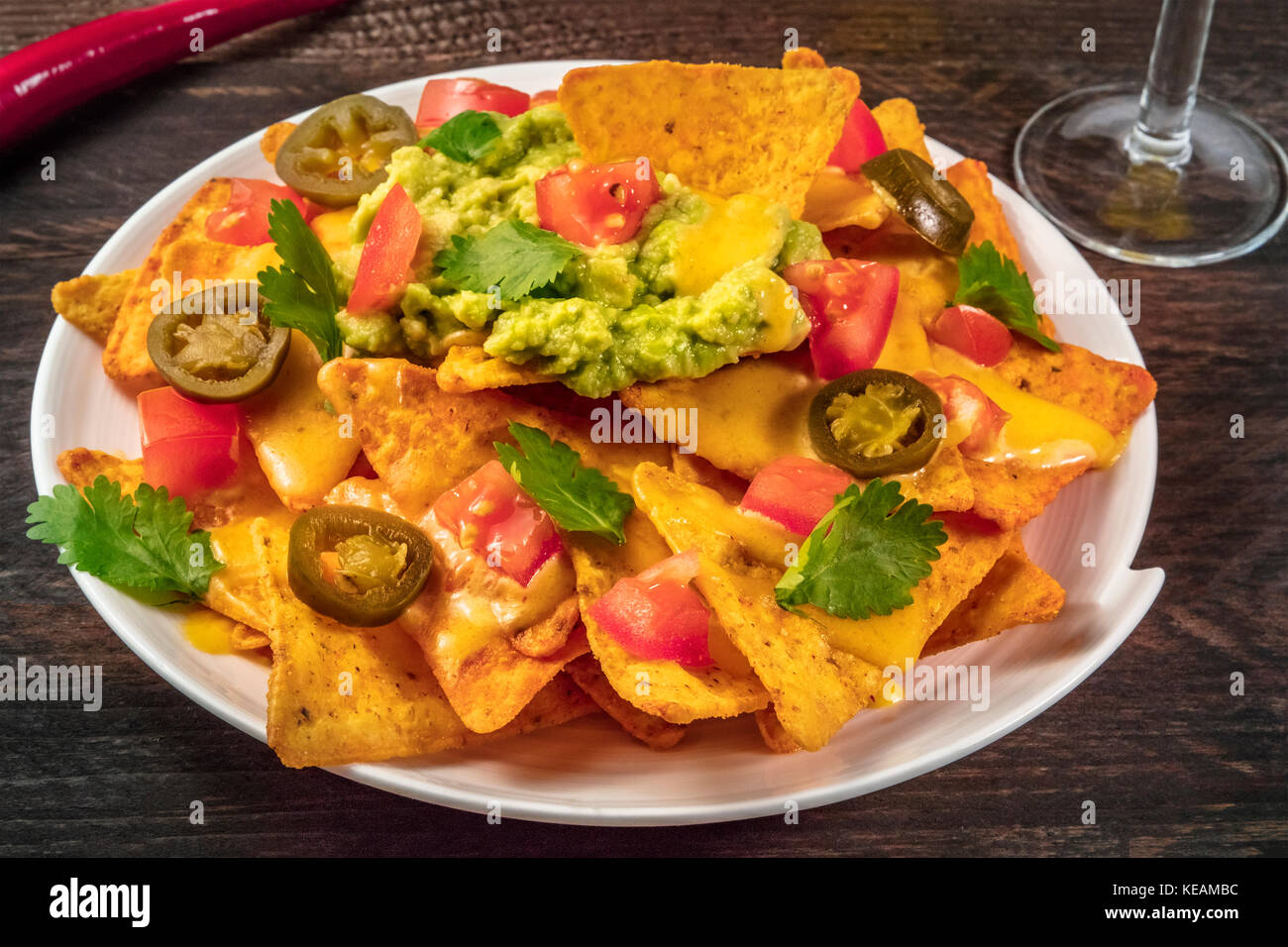 A photo of nachos with queso, traditional Mexican snack, on a rustic ...