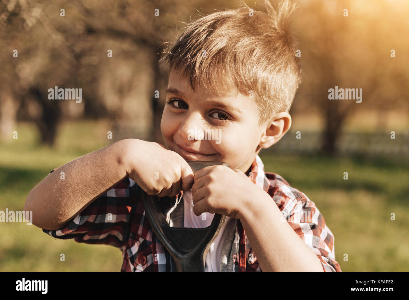 Positive delighted boy looking at camera Stock Photo - Alamy