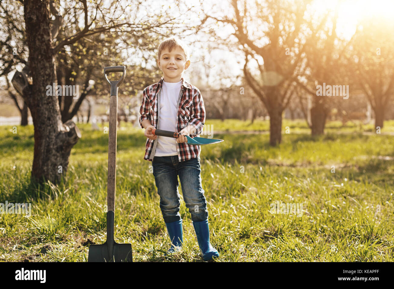 Positive delighted child demonstrating his instrument Stock Photo - Alamy