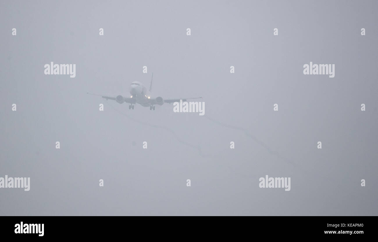 A Lot Polish Airlines plane lands in fog at Heathrow Airport, London ...
