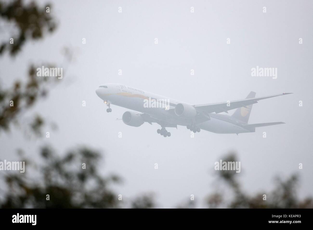 A Jet Airways plane lands in fog at Heathrow Airport, London Stock ...
