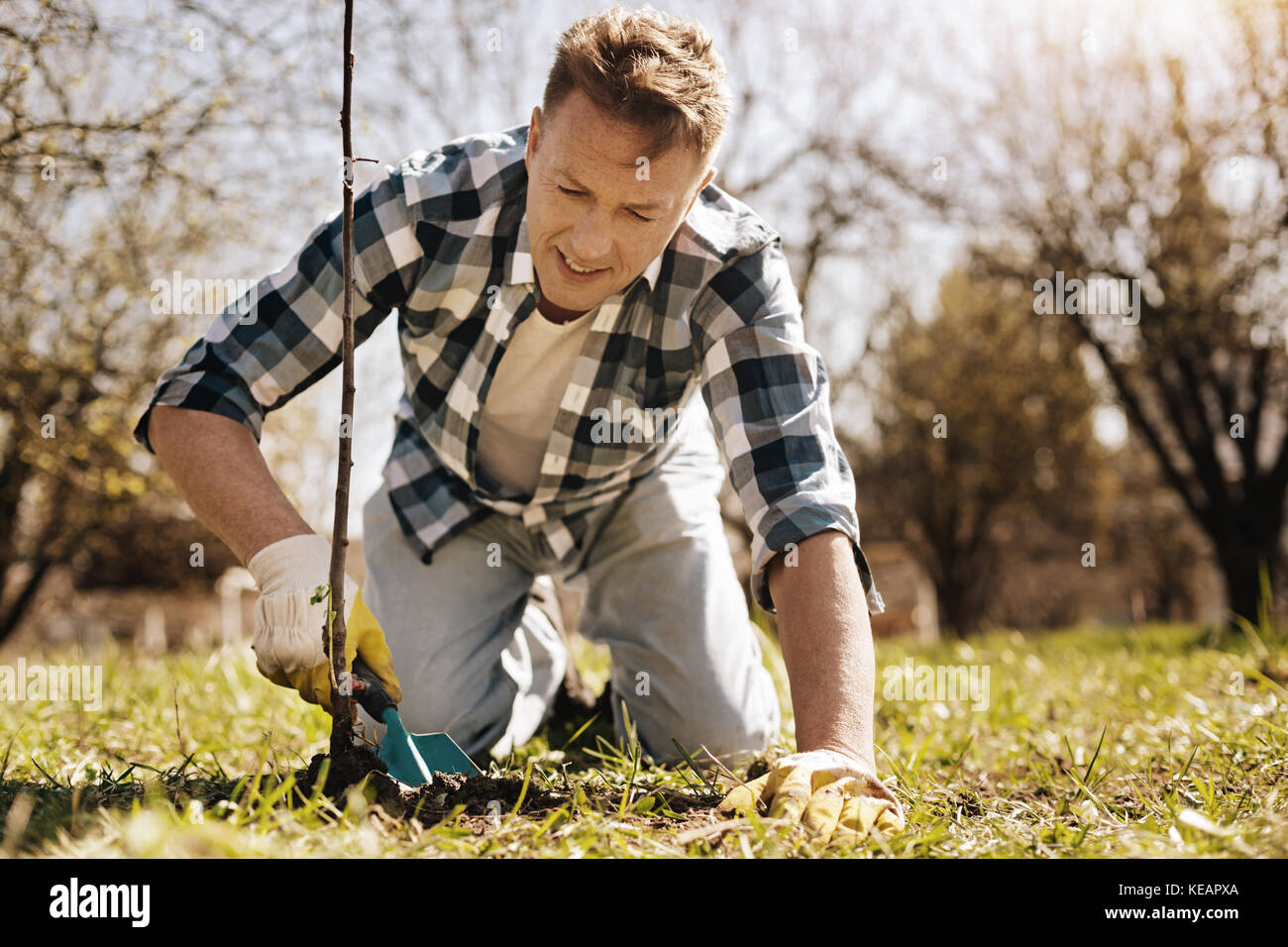 Gardener digging hi-res stock photography and images - Alamy