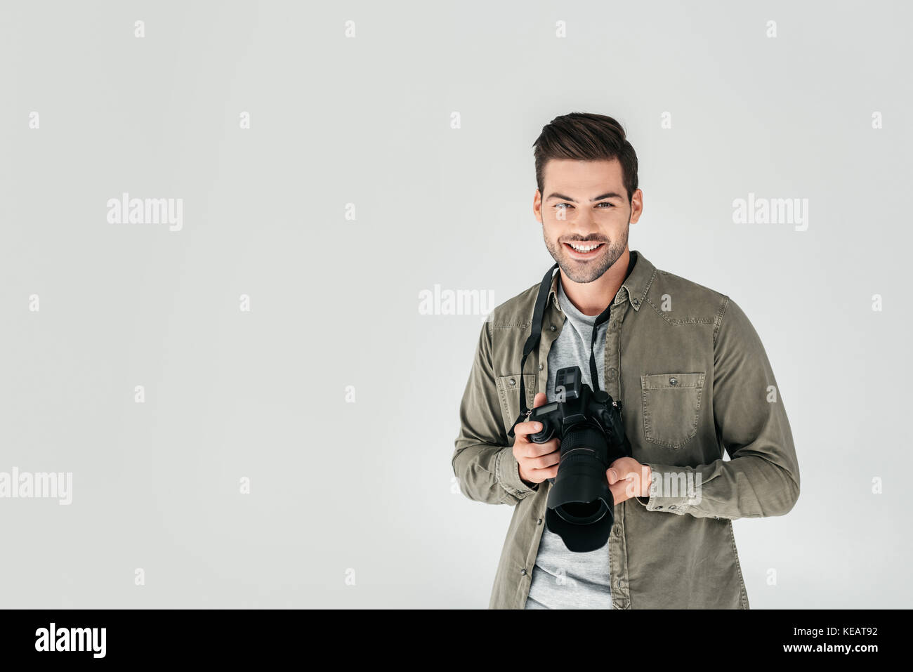 male photographer with digital camera Stock Photo - Alamy