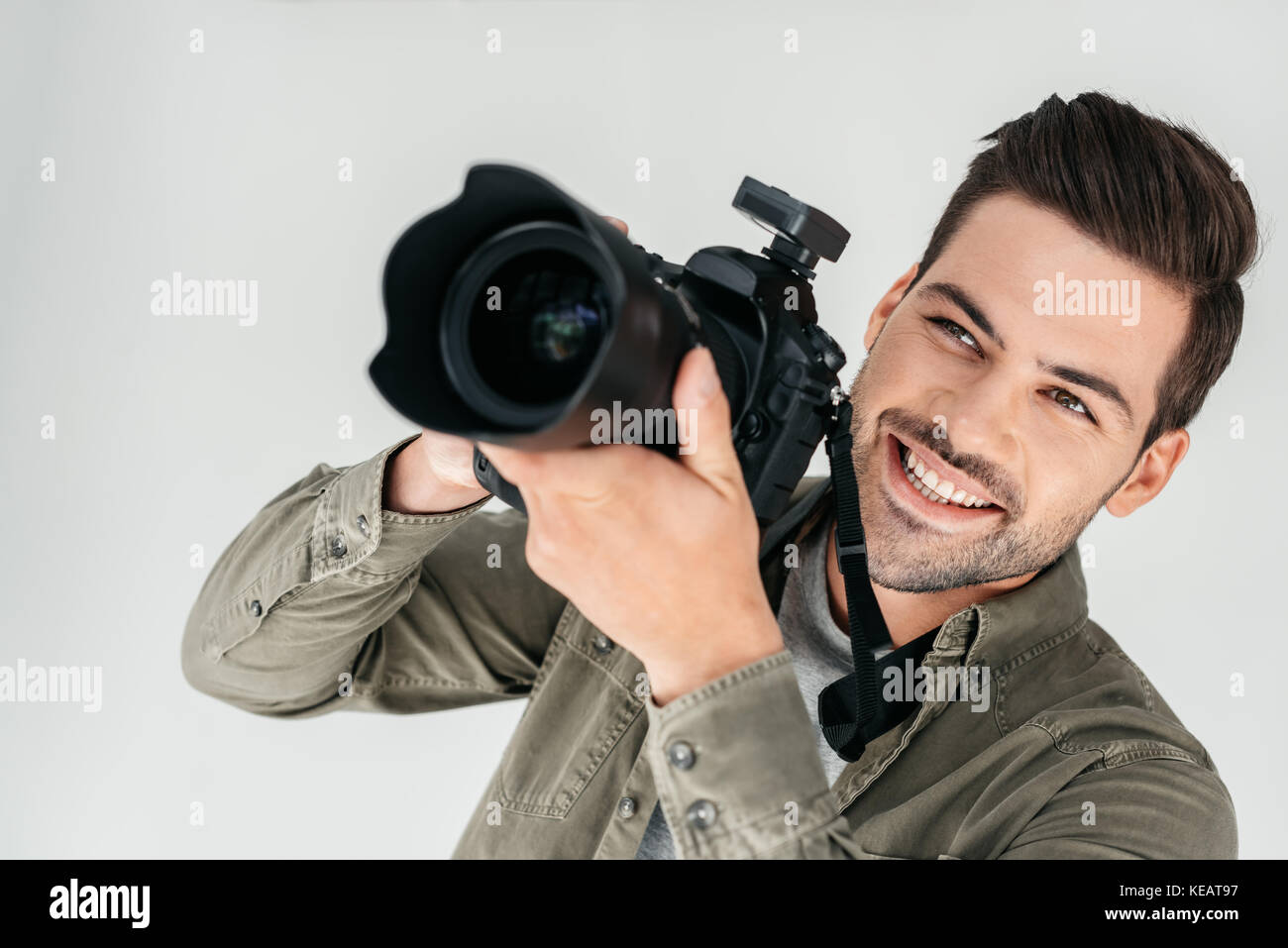 Smiling photographer digital camera hi-res stock photography and images ...