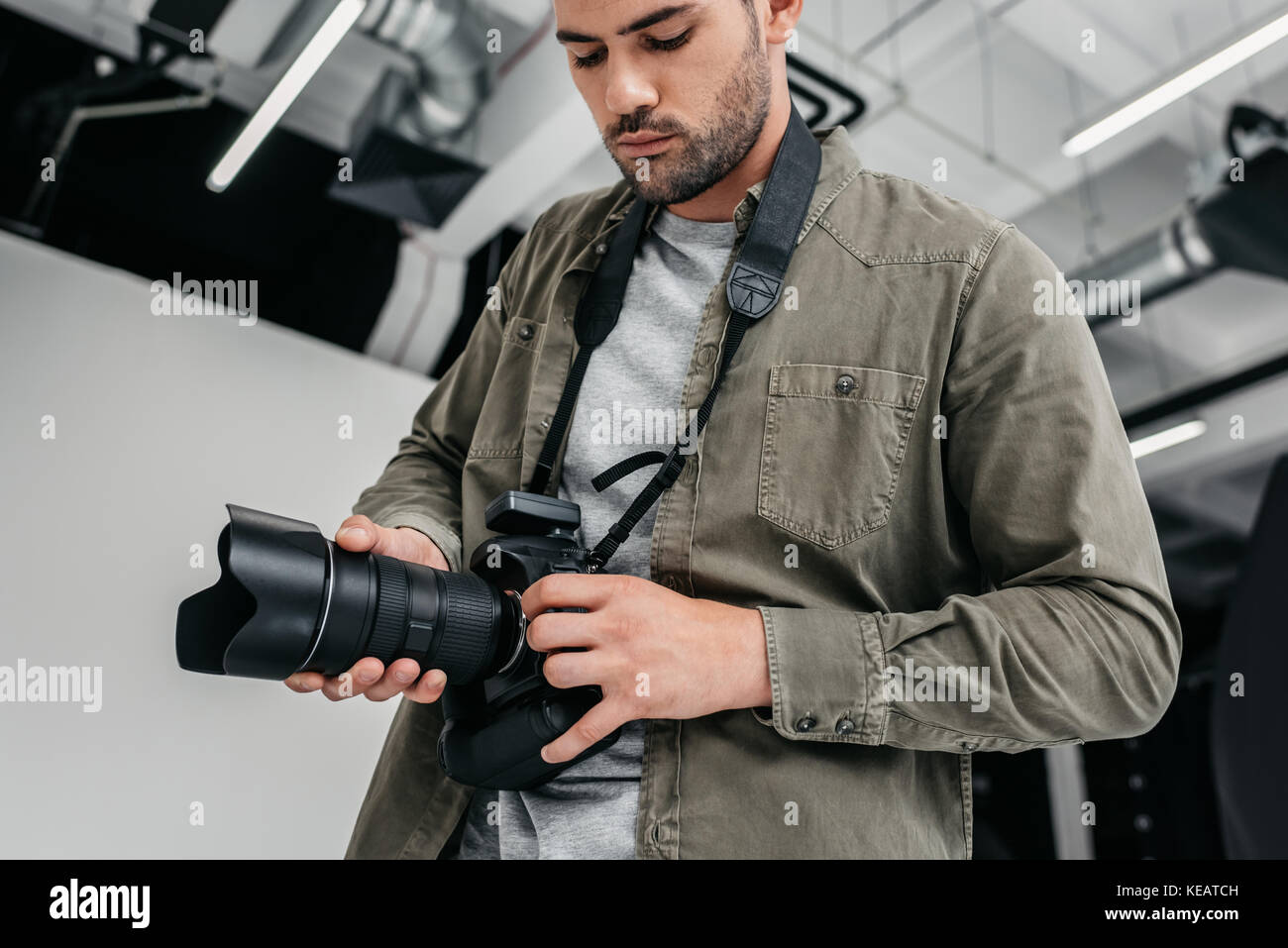 professional photographer with digital camera Stock Photo - Alamy
