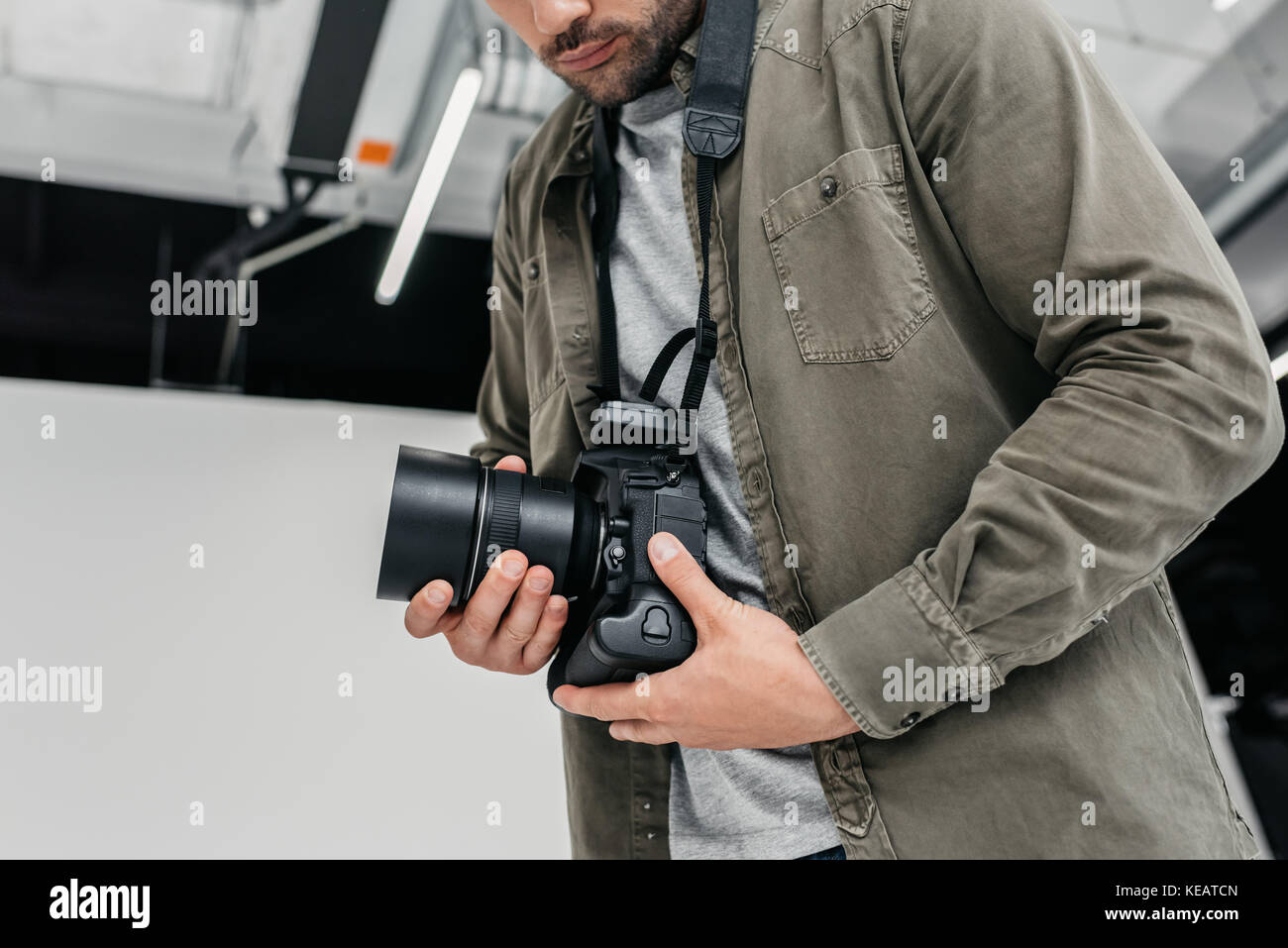 photographer with digital camera and lens Stock Photo - Alamy