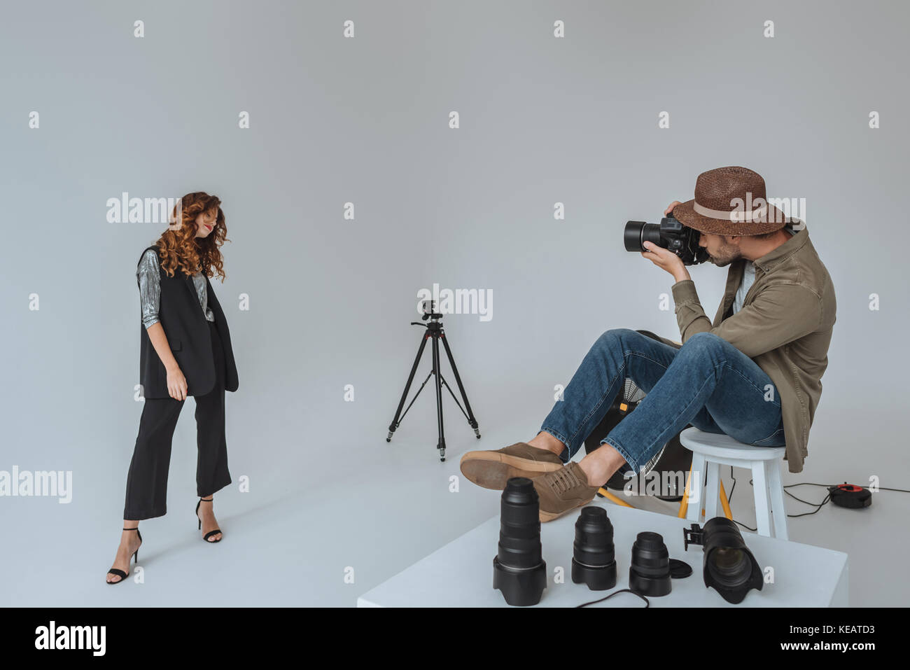 photographer and model in photo studio Stock Photo - Alamy