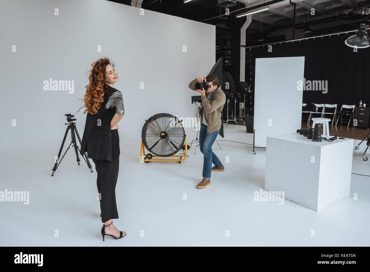 photographer and model in photo studio Stock Photo - Alamy