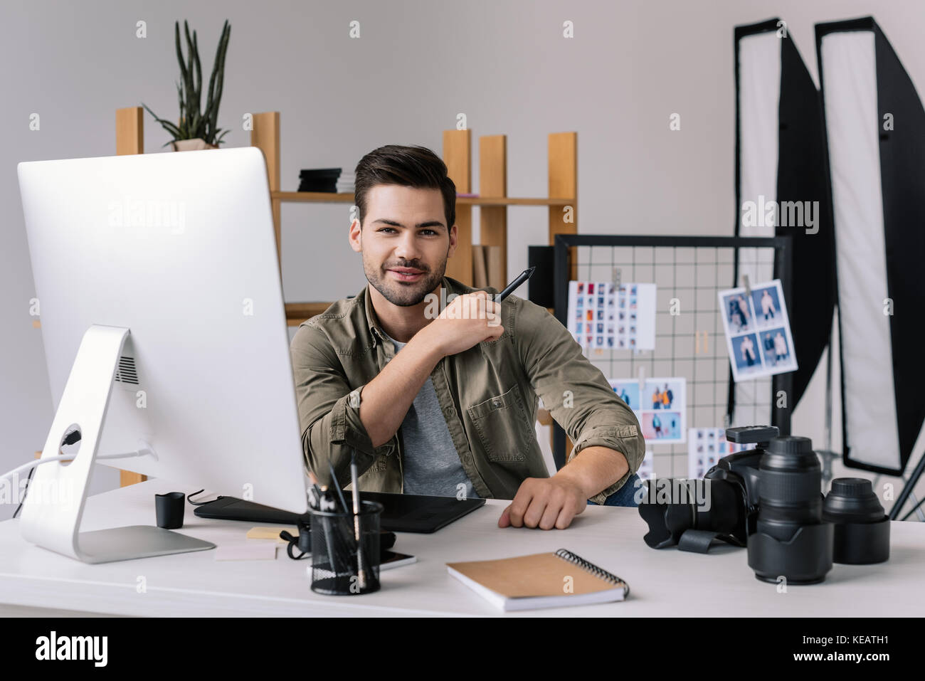 photographer with graphics tablet Stock Photo - Alamy