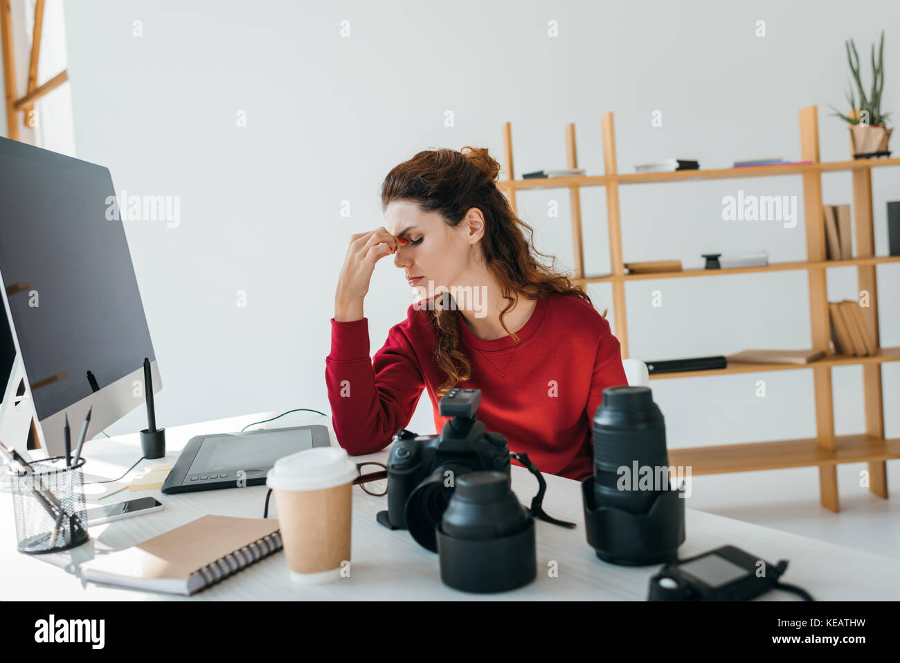 tired female photographer Stock Photo - Alamy