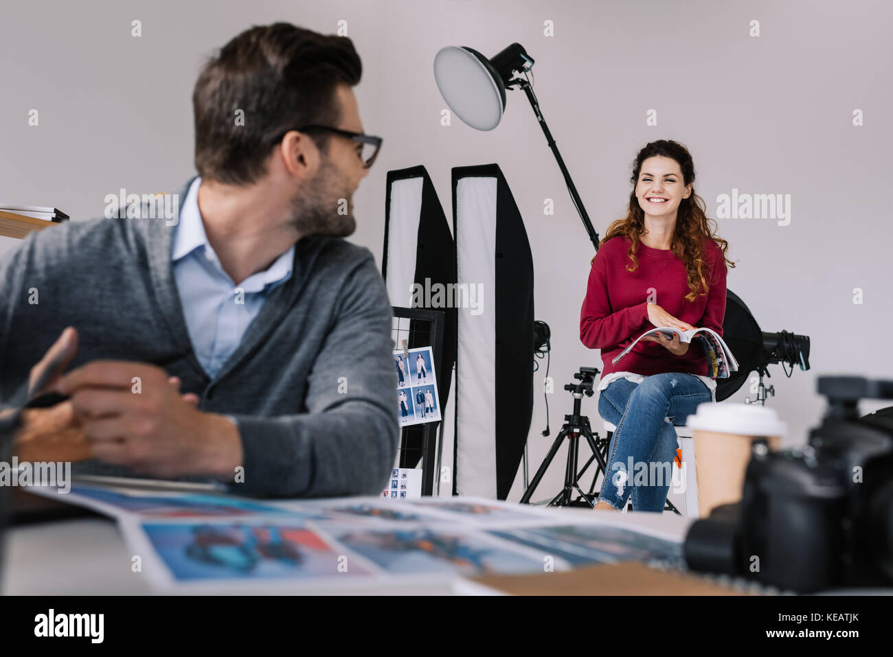 photographer and model in office Stock Photo - Alamy