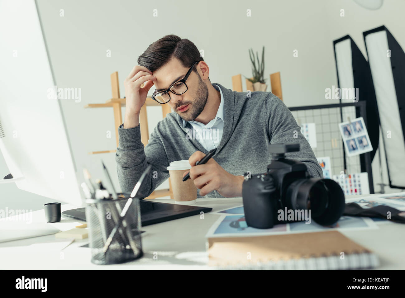 photographer working with graphics tablet Stock Photo - Alamy