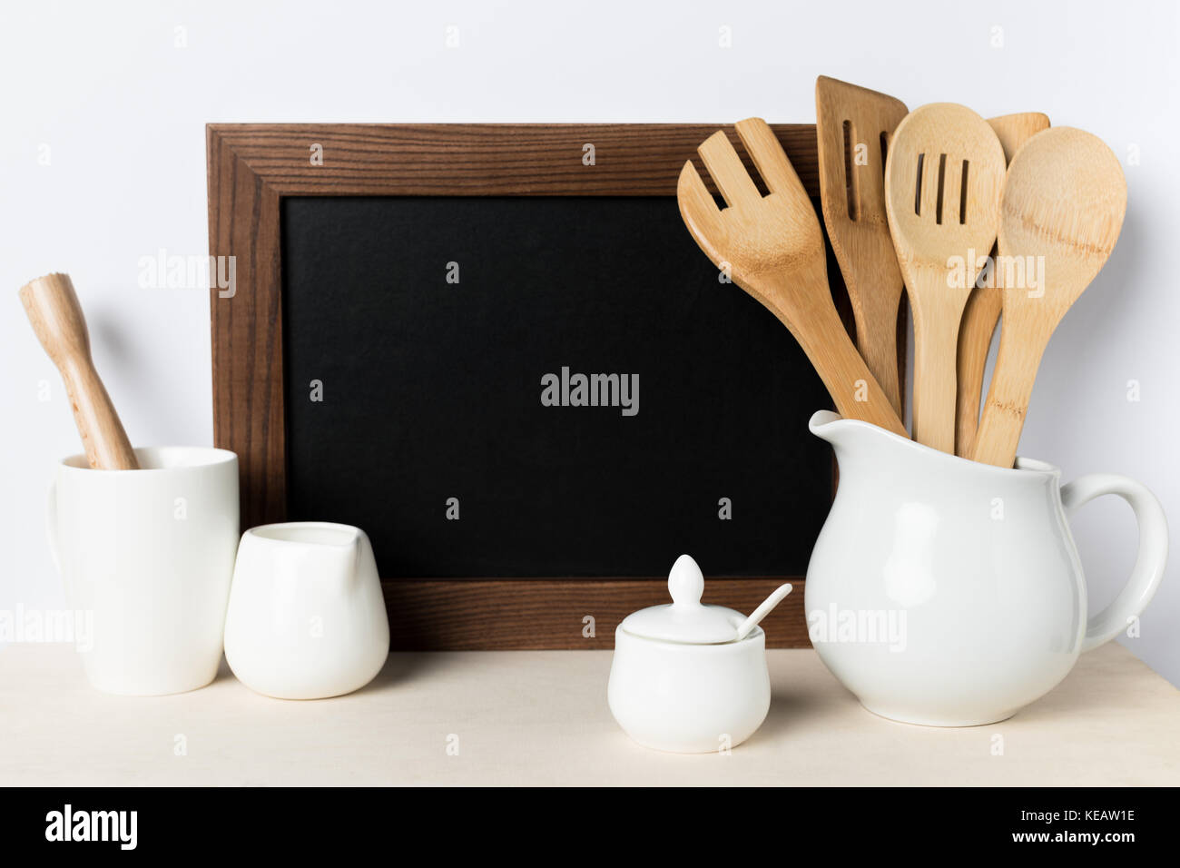 blank board and kitchen utensils Stock Photo - Alamy