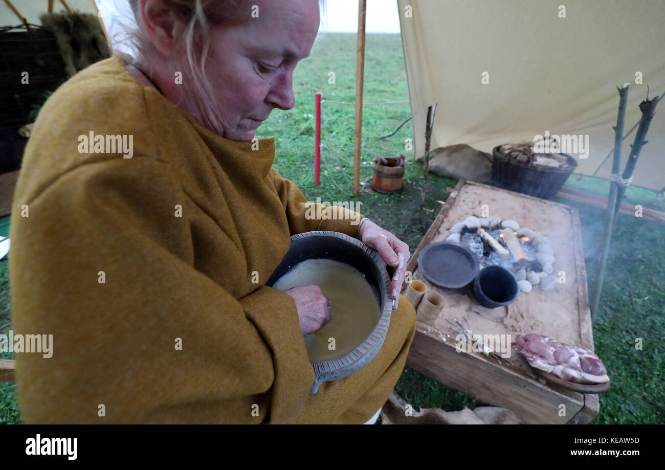 Living History re-enactor Jill Hatch makes cheese during a preview for ...