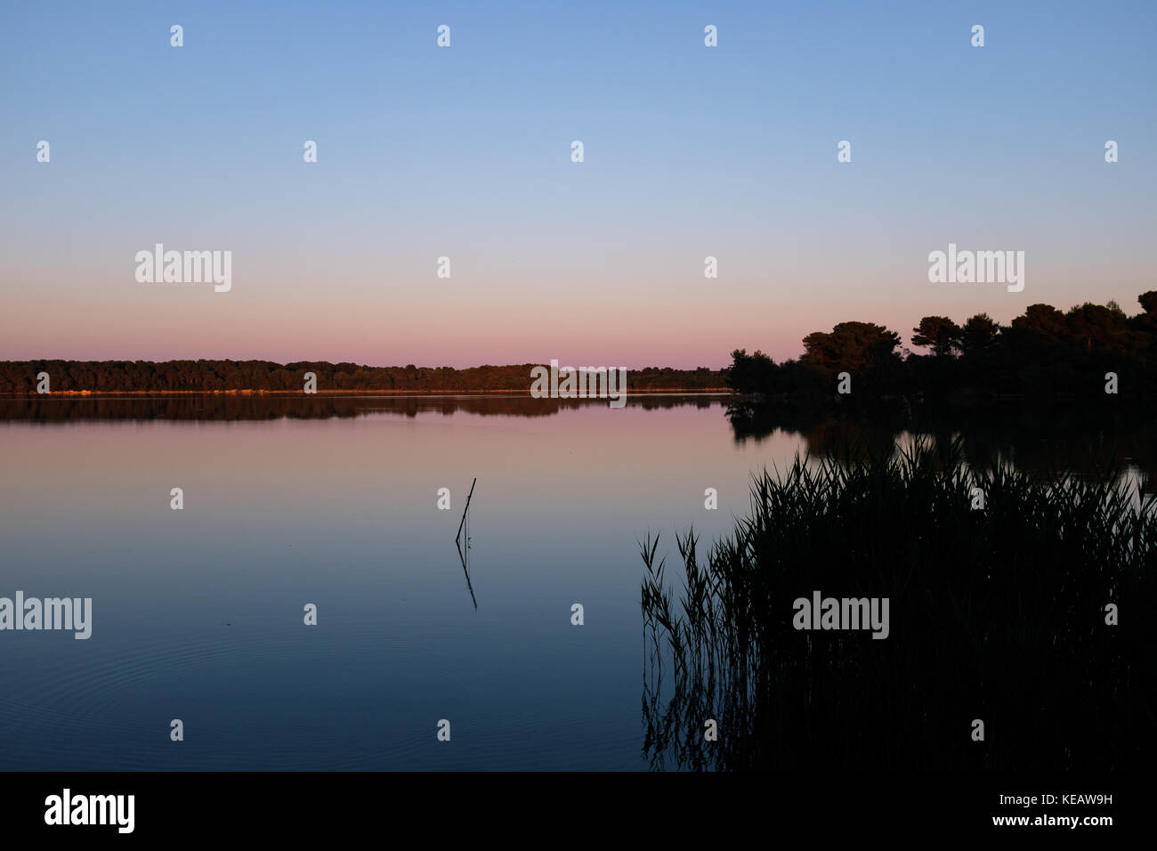 Sunset over Alimini lake near Otranto. Apulia Stock Photo - Alamy