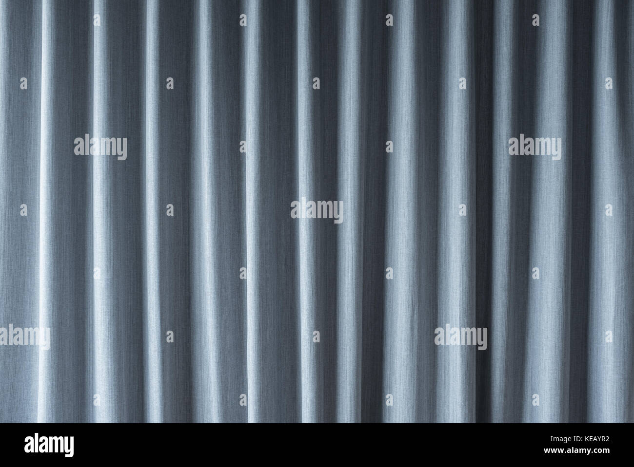 grey curtain background or grey drape background Stock Photo - Alamy