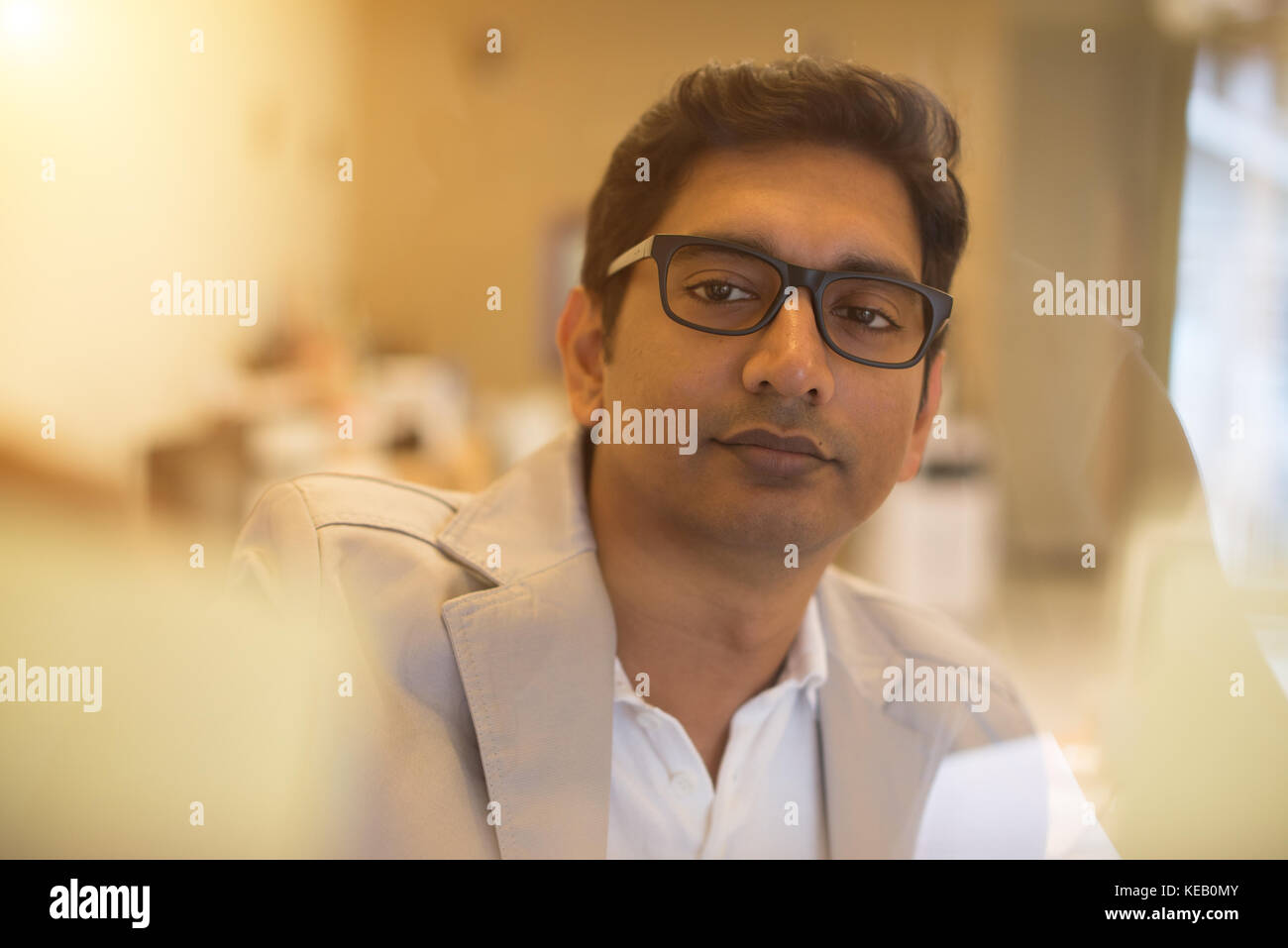 indian business male writing glass wall Stock Photo - Alamy