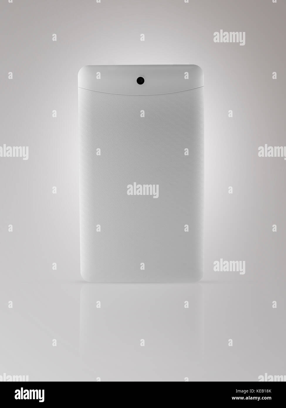 the back side of the tablet with reflection on light background ...