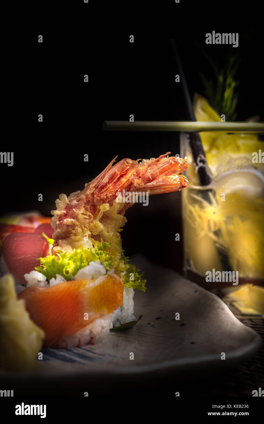 sushi plate and a cocktail in a japanese restaurant Stock Photo - Alamy