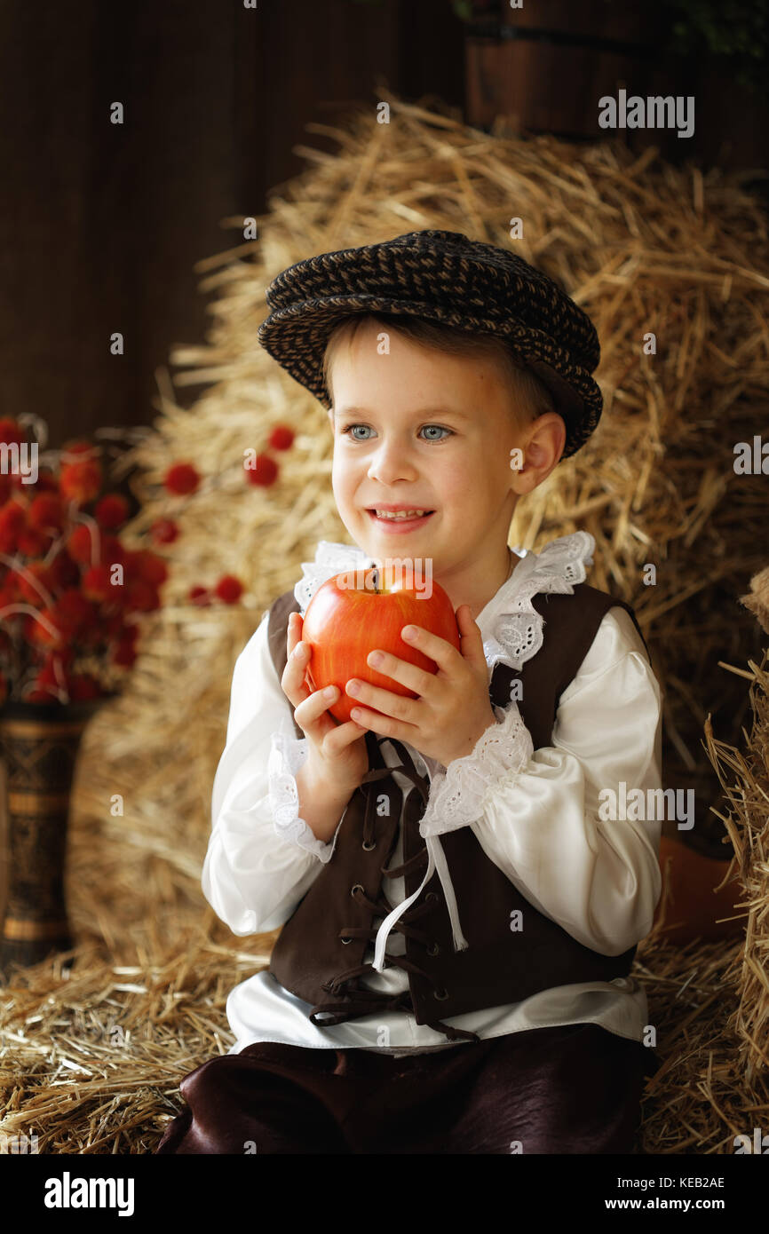 cute little european boy in the cap with blue eyes and bunny Stock ...