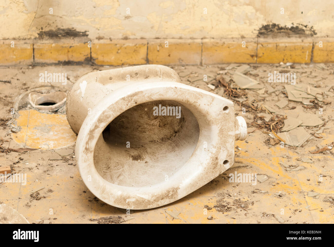Abandoned home interior with objects on the floor - clothes and ...