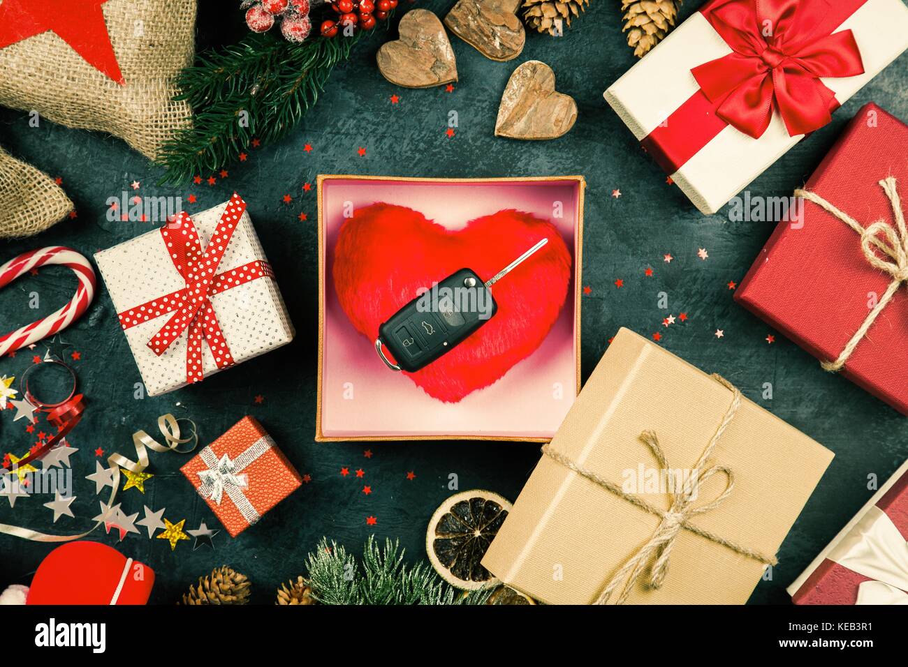 Lots of Christmas presents on dark background Stock Photo - Alamy