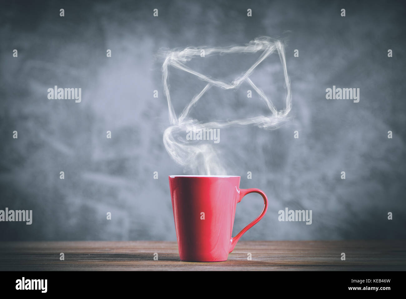 Cup of coffee with envelope-shaped steam Stock Photo - Alamy