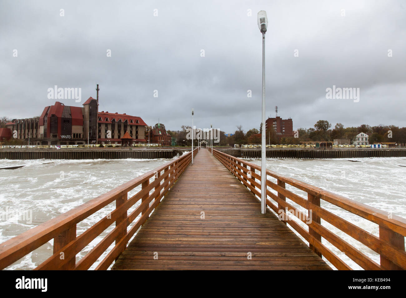 Long wooden pier at the sea Stock Photo - Alamy