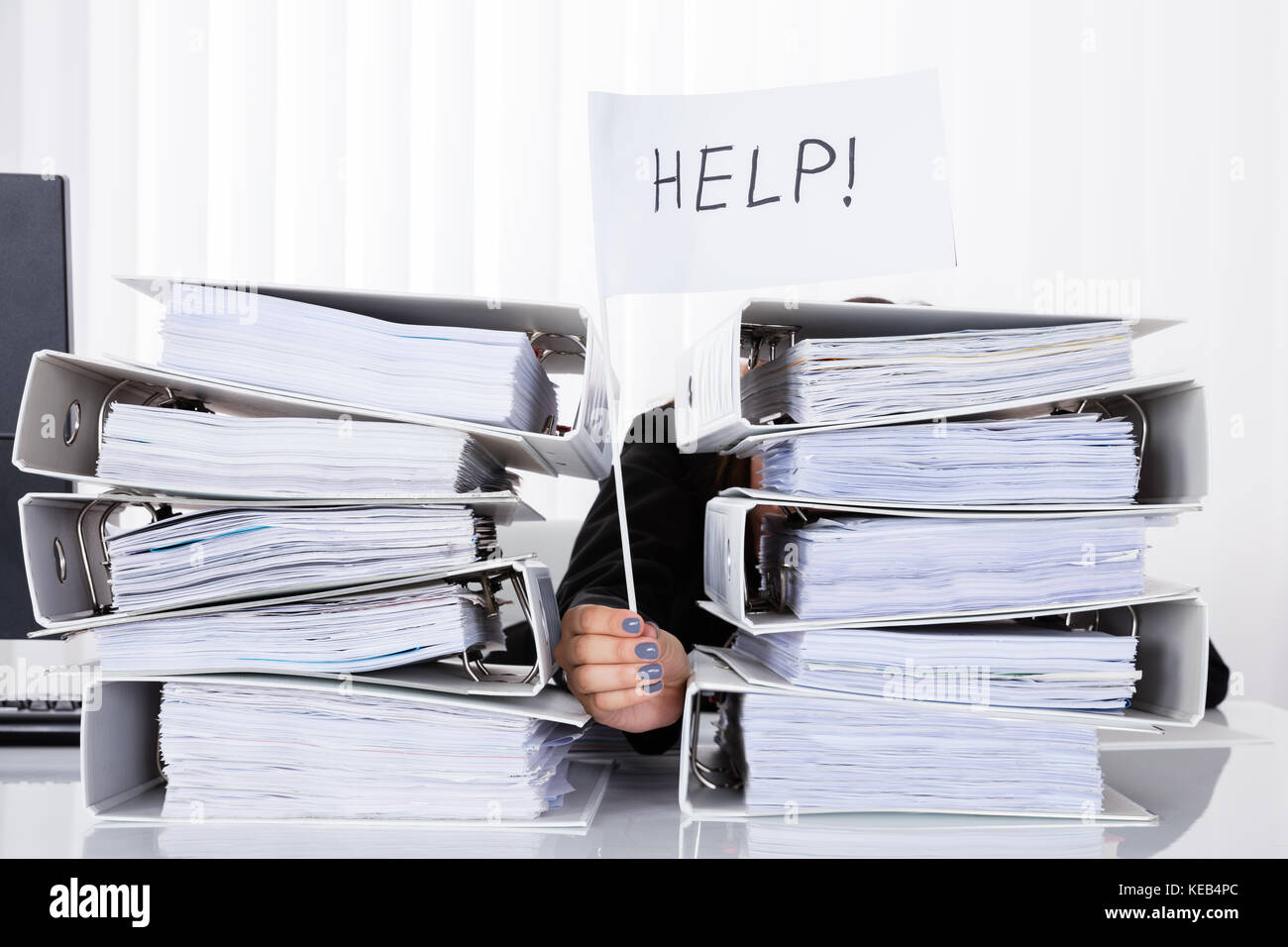 Businesswoman Hand Holding Help Flag In Between The Stack Of Folders On ...