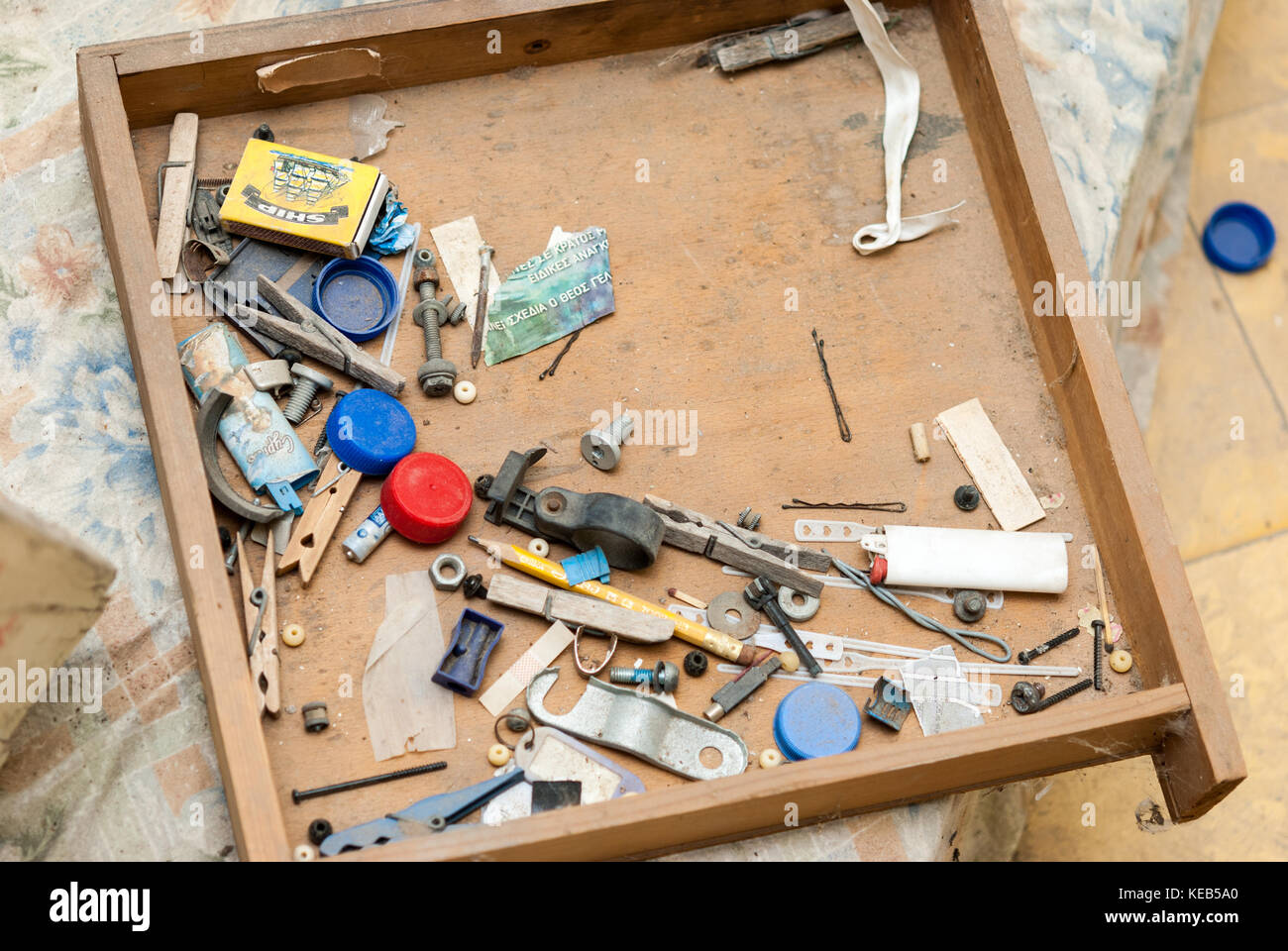 Abandoned home interior with objects on the floor - clothes and ...