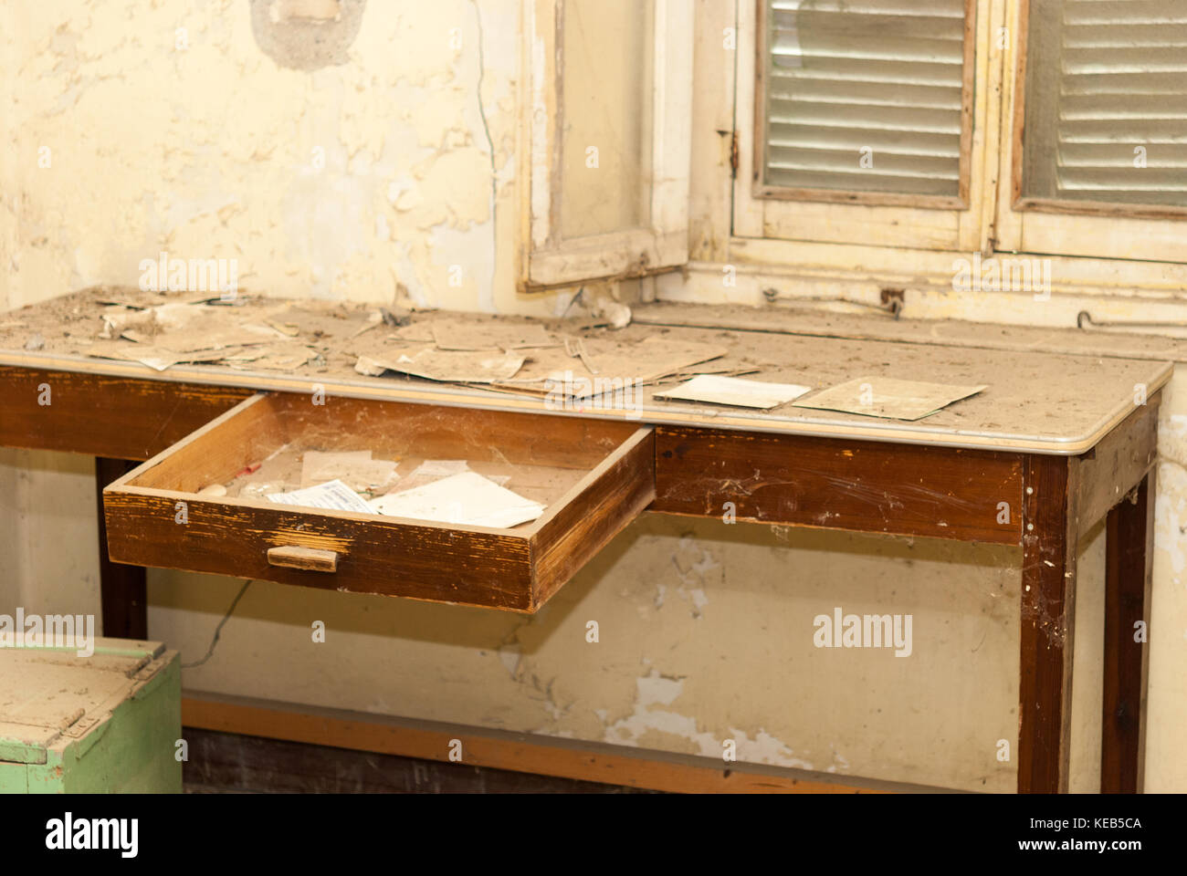 Old wooden desk in abandoned home Stock Photo - Alamy
