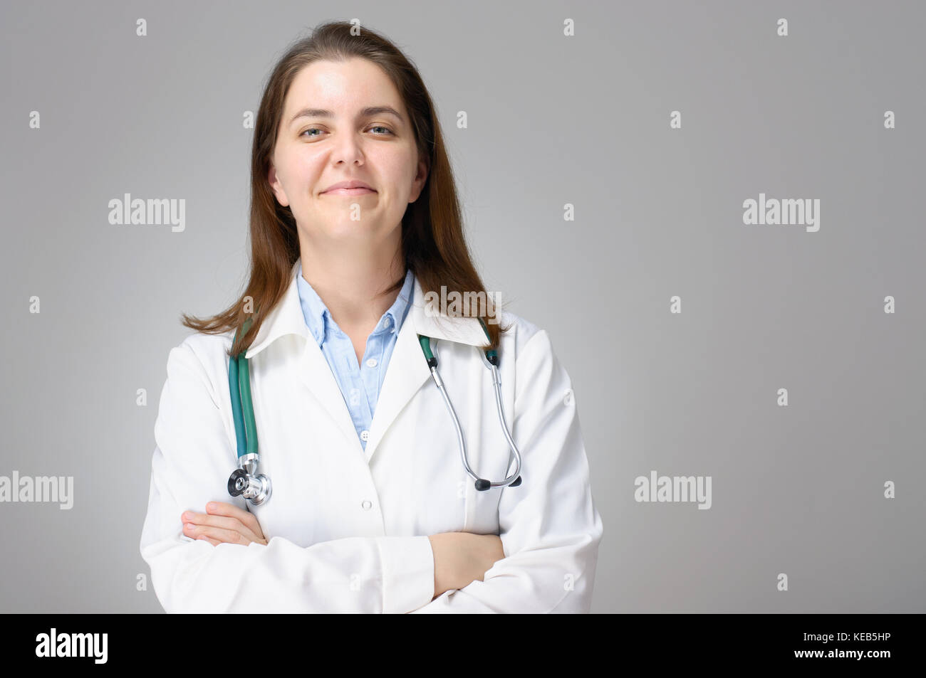 Portrait of a smiling, friendly female doctor Stock Photo - Alamy
